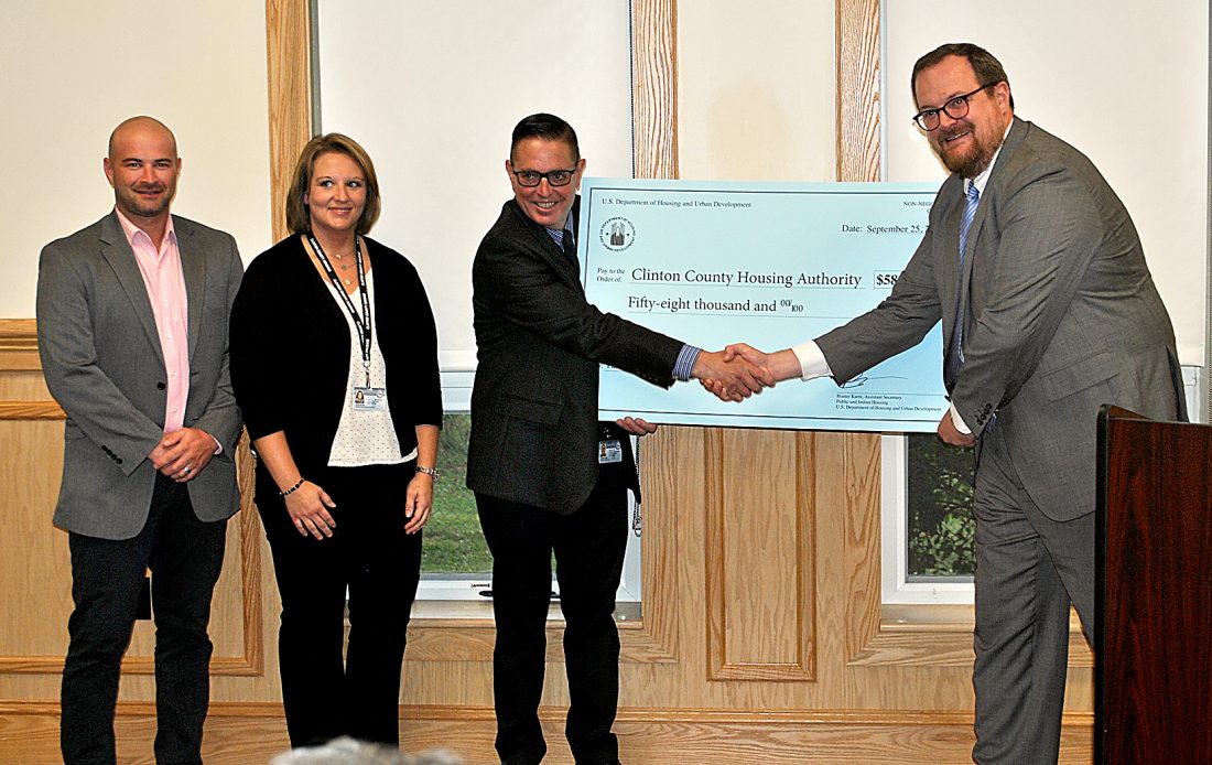 HUD official tours public housing, presents $58,000 to housing ...